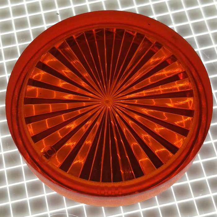 I_119_R_T_S_AM 1-3/16" Round Transparent Starburst Amber Playfield Insert